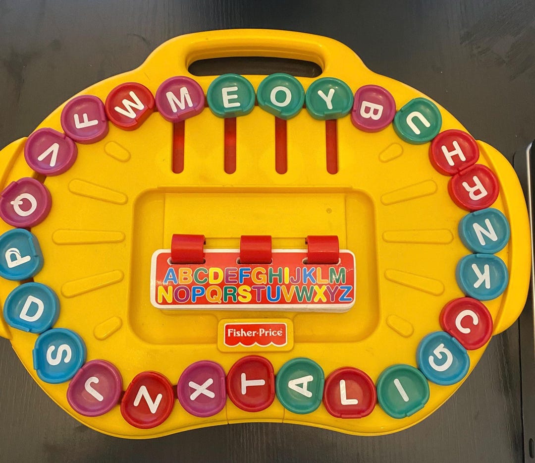 Fisher Price Alpha Go Round Word Building Learning Educational Spelling ...