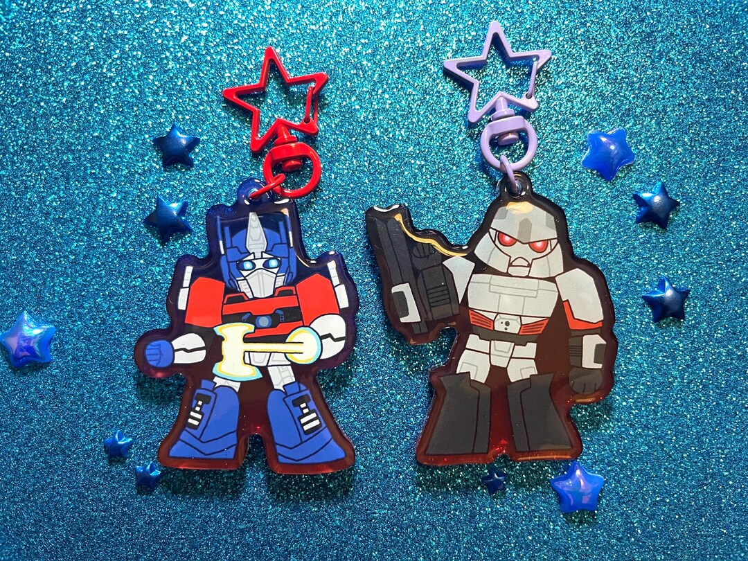 LIMITED STOCK Transformers One Optimus Prime and Megatron Epoxy Charms ...
