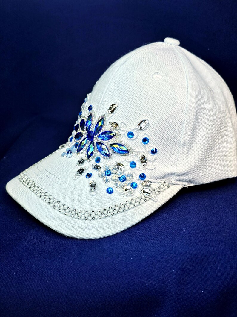 White Baseball Hat Enhanced With White Lace, Accented With Bright Blue ...