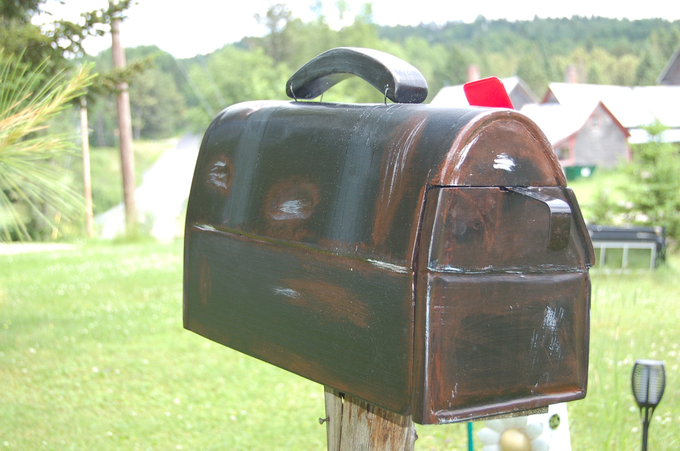 Lunch pail mailbox, lunch mailbox. old black lunch box mailbox, beaten ...