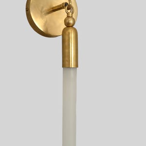 Illuminate Your Space With the TASSEL 1 Sconce. This Modern Wall Light ...