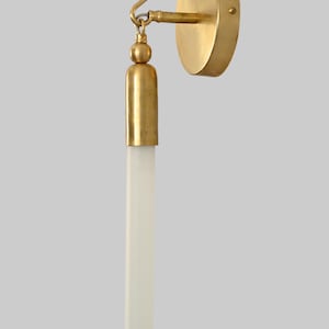 Illuminate Your Space With the TASSEL 1 Sconce. This Modern Wall Light ...