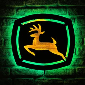 deer logo green