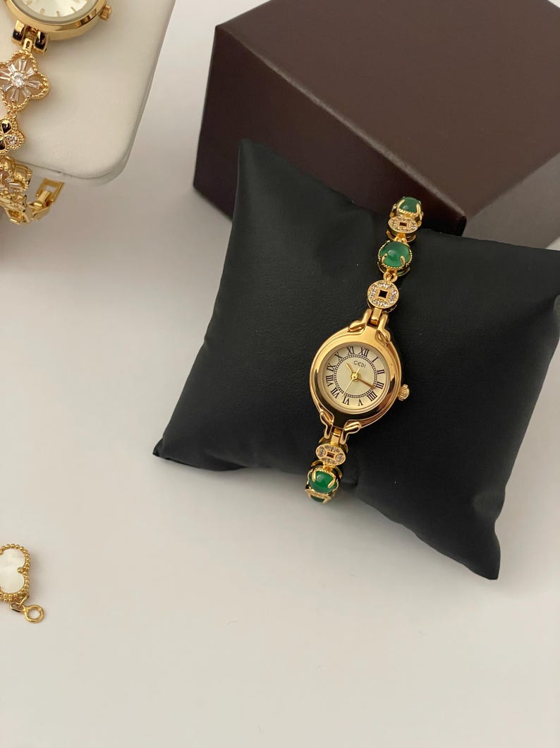 Vintage-inspired Gold Bracelet Watch With Green Stone & Crystal Accents ...