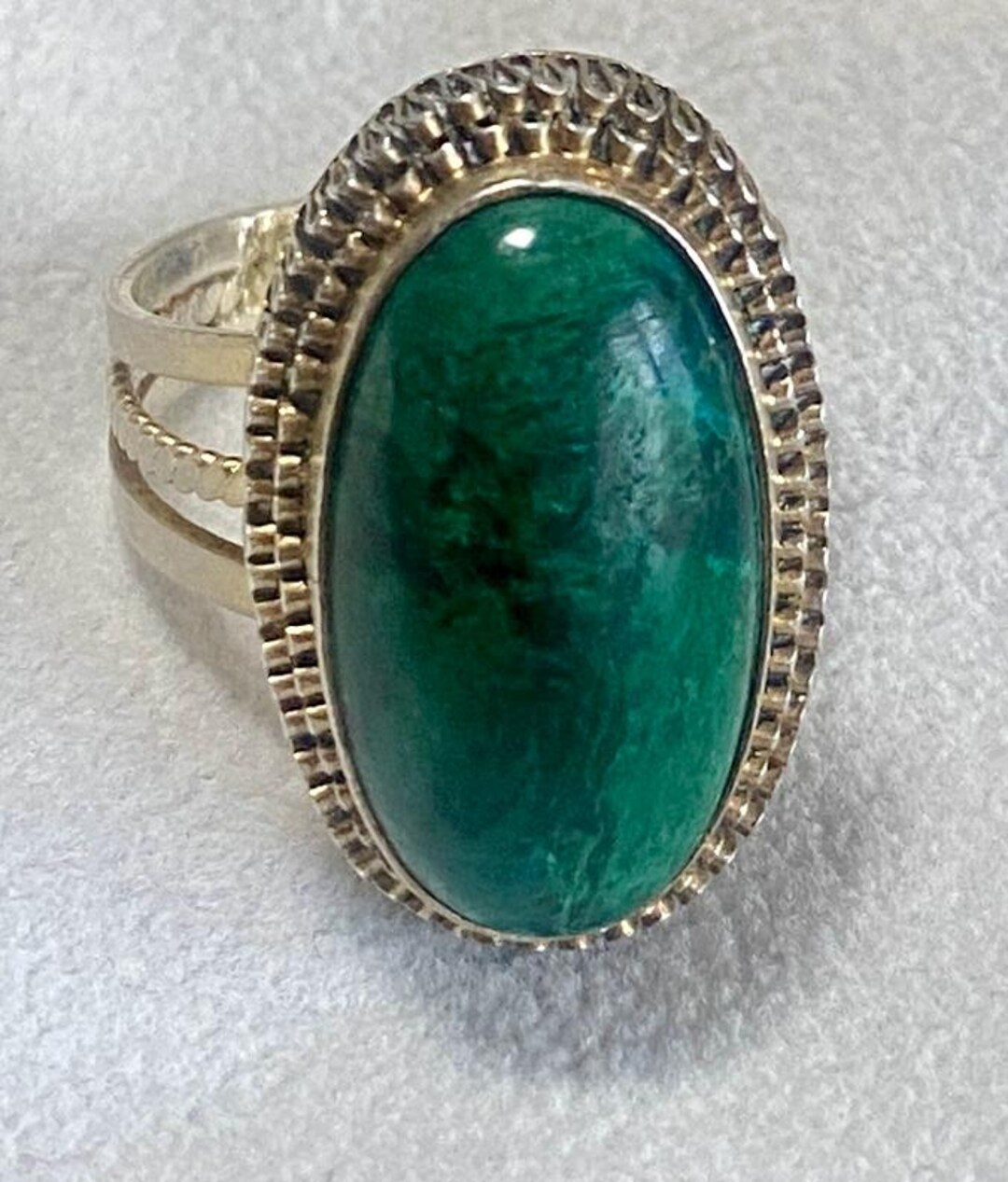 A Sterling Silver Ring With A Bezel Set Malachite Cabachon in a Size 8 ...
