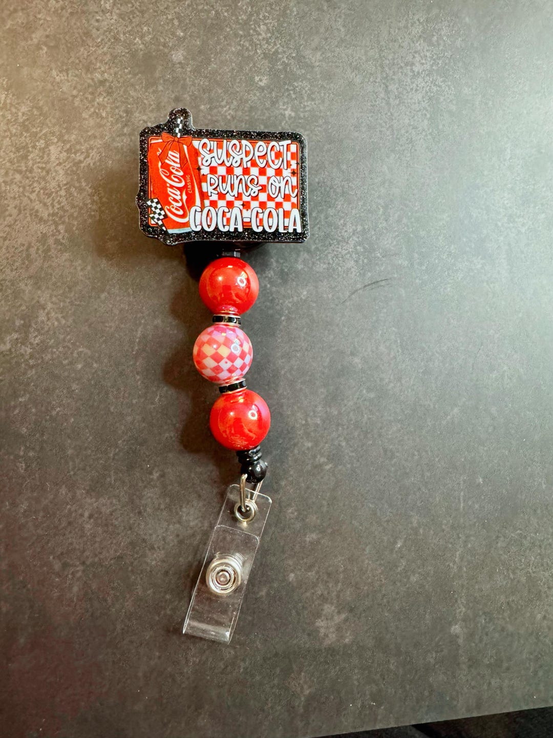 Suspect Runs on Coca Cola Badge Reel - Etsy