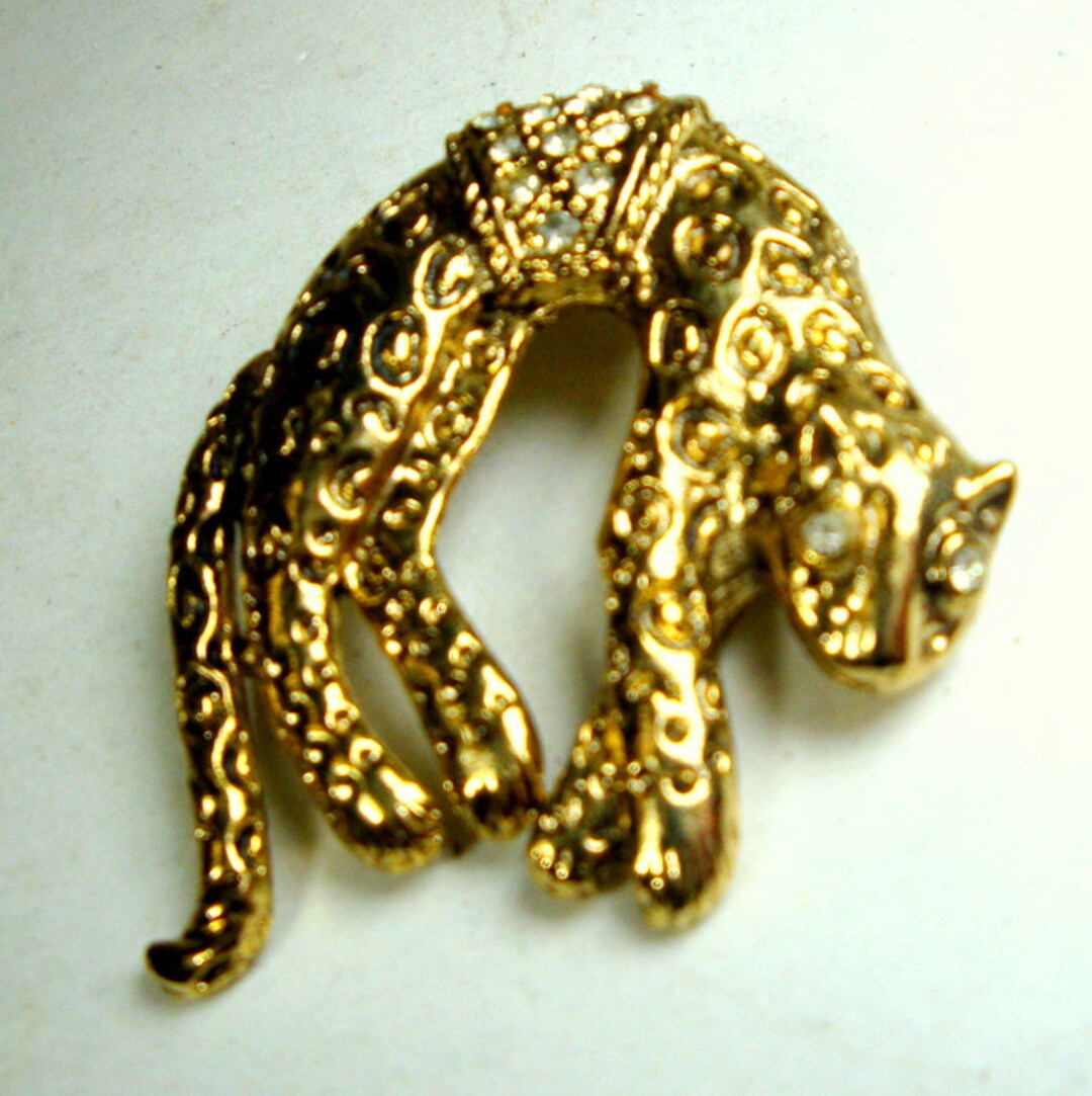 Broche léopard, broche chat sauvage en émail noir sur or, selle et yeux ...