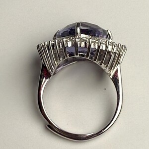 Beautiful Trillion Cut Musgravite Ring 11.45CT. Accent Stones Are Round ...
