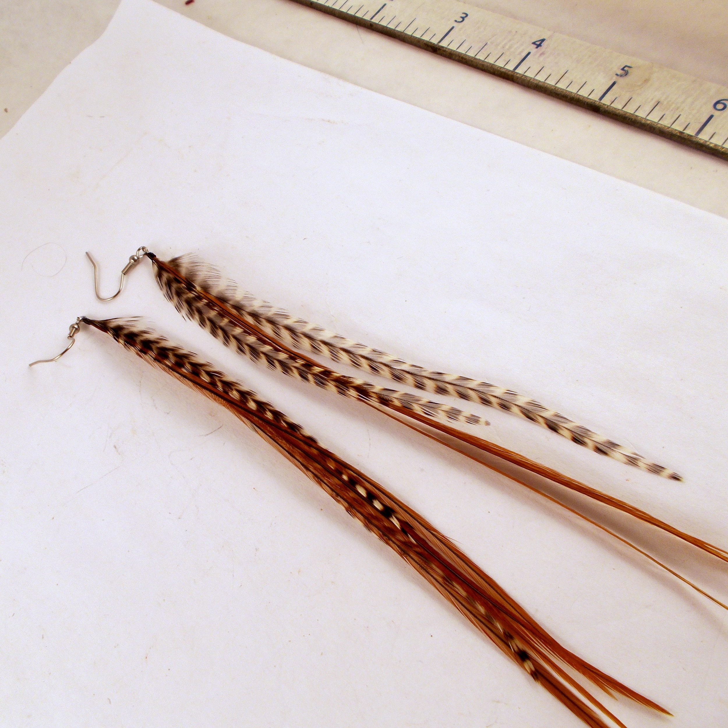 Natural Brown feather earrings with grizzly | Etsy