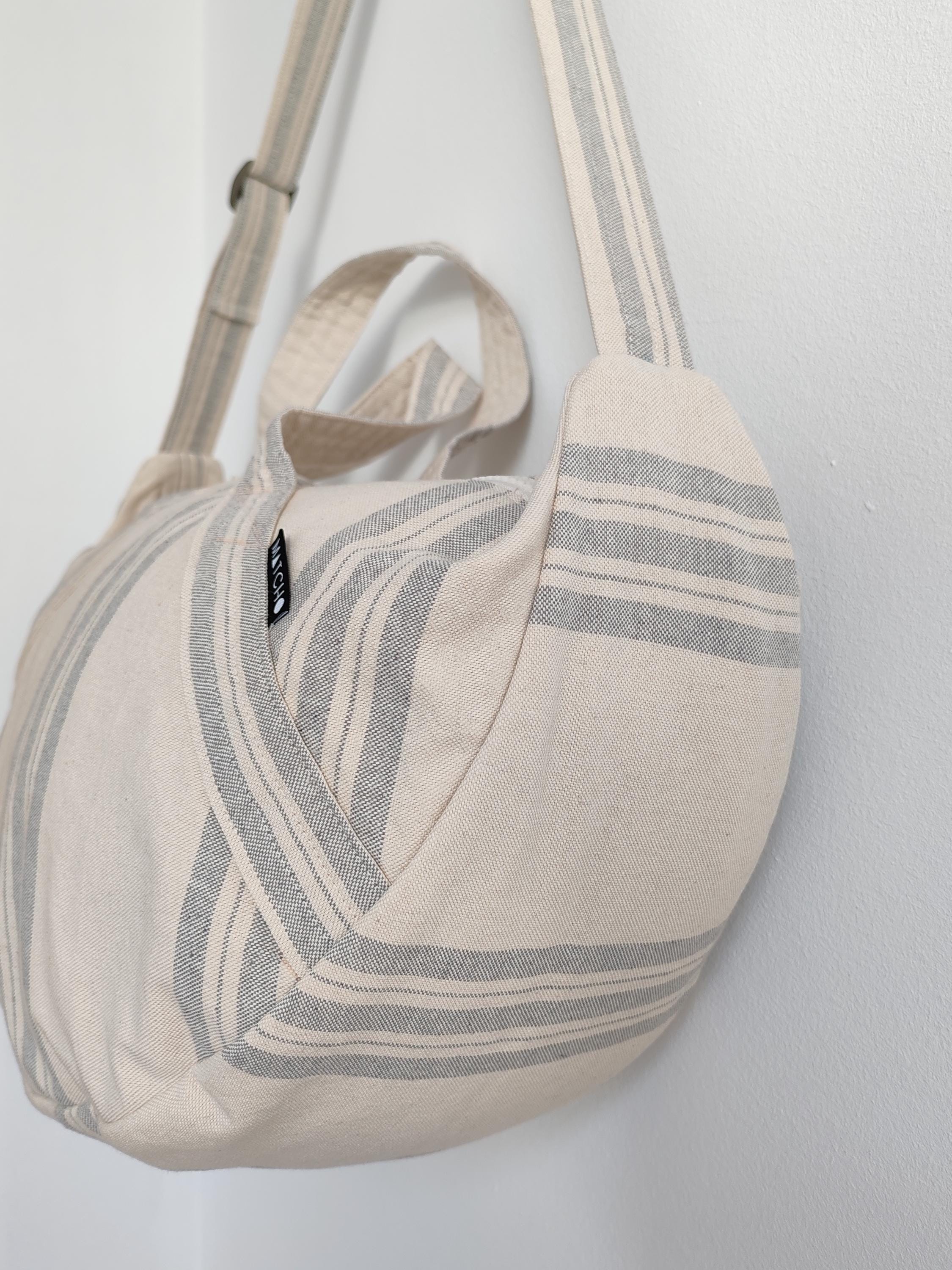 A Stylish Half Moon Bag, Designed for Versatility and Functionality. A ...