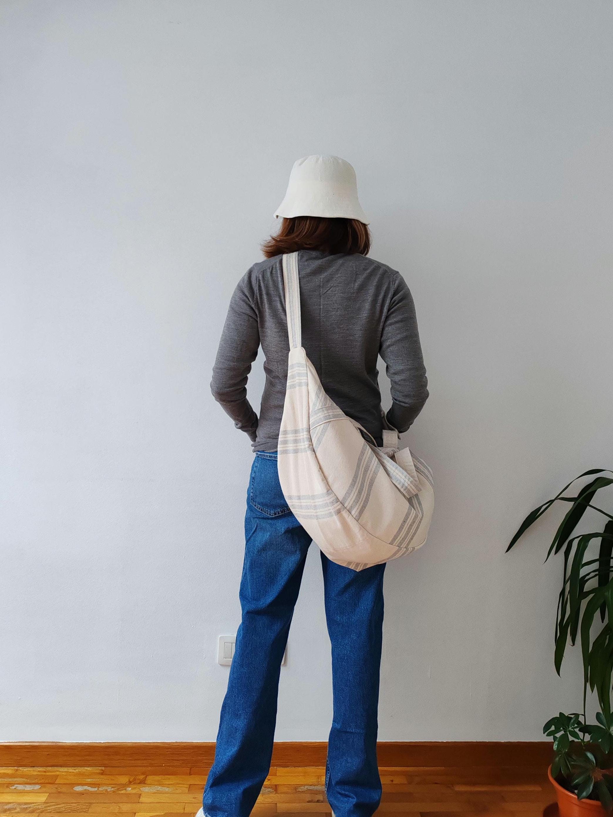 A Stylish Half Moon Bag, Designed for Versatility and Functionality. A ...