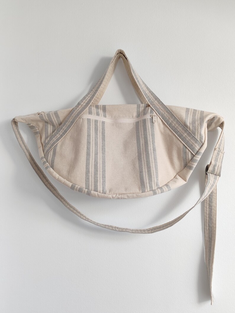 A Stylish Half Moon Bag, Designed for Versatility and Functionality. A ...