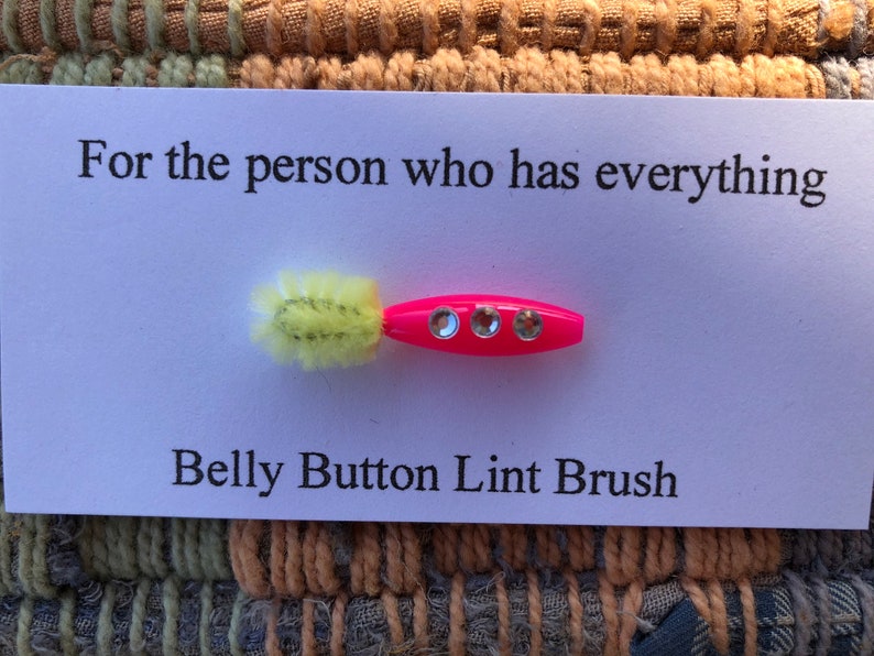 Jeweled Belly Button Lint Brush For The Person Who Has Everything Party Supplies Party Favors jeweled-belly-button-lint-brush-for-the-person-who-has-everything-party-supplies-party-favors