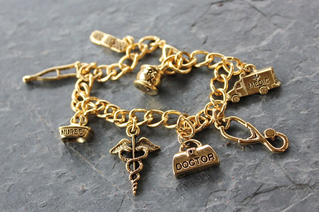 Gold Plated Medical Symbols Charm Bracelet- 22k Gold Plated Pewter ...