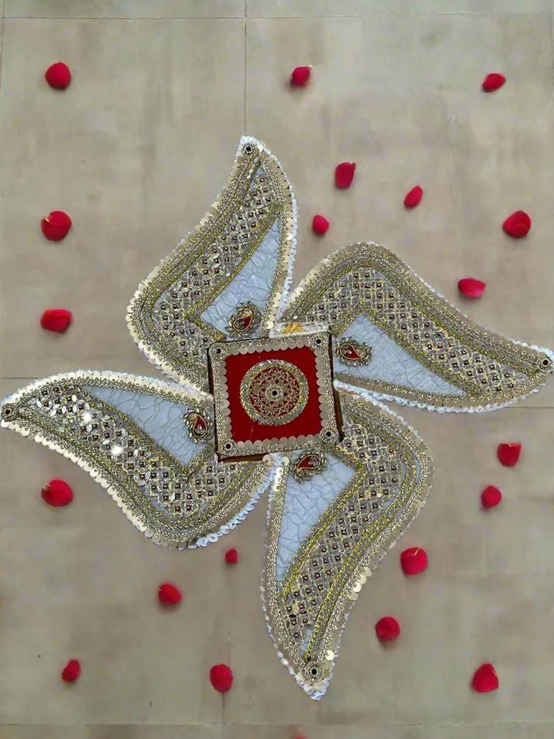 Elegant Swastik Rangoli Design Handcrafted Floor Art for Festivals and ...