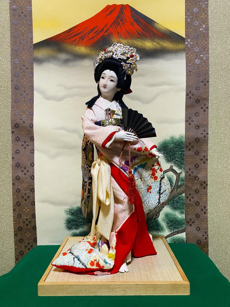Beautiful, cute, geisha doll. Gorgeous peach and white costume. She ...