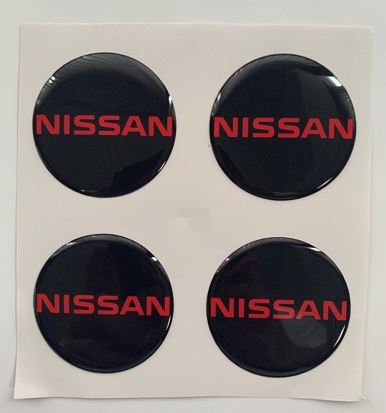Excellent Quality / Set X 4 Self Adhesive Silicone Stickers Logo Nissan ...