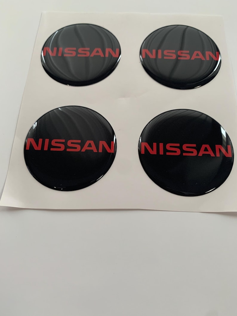 Excellent Quality / Set X 4 Self Adhesive Silicone Stickers Logo Nissan ...