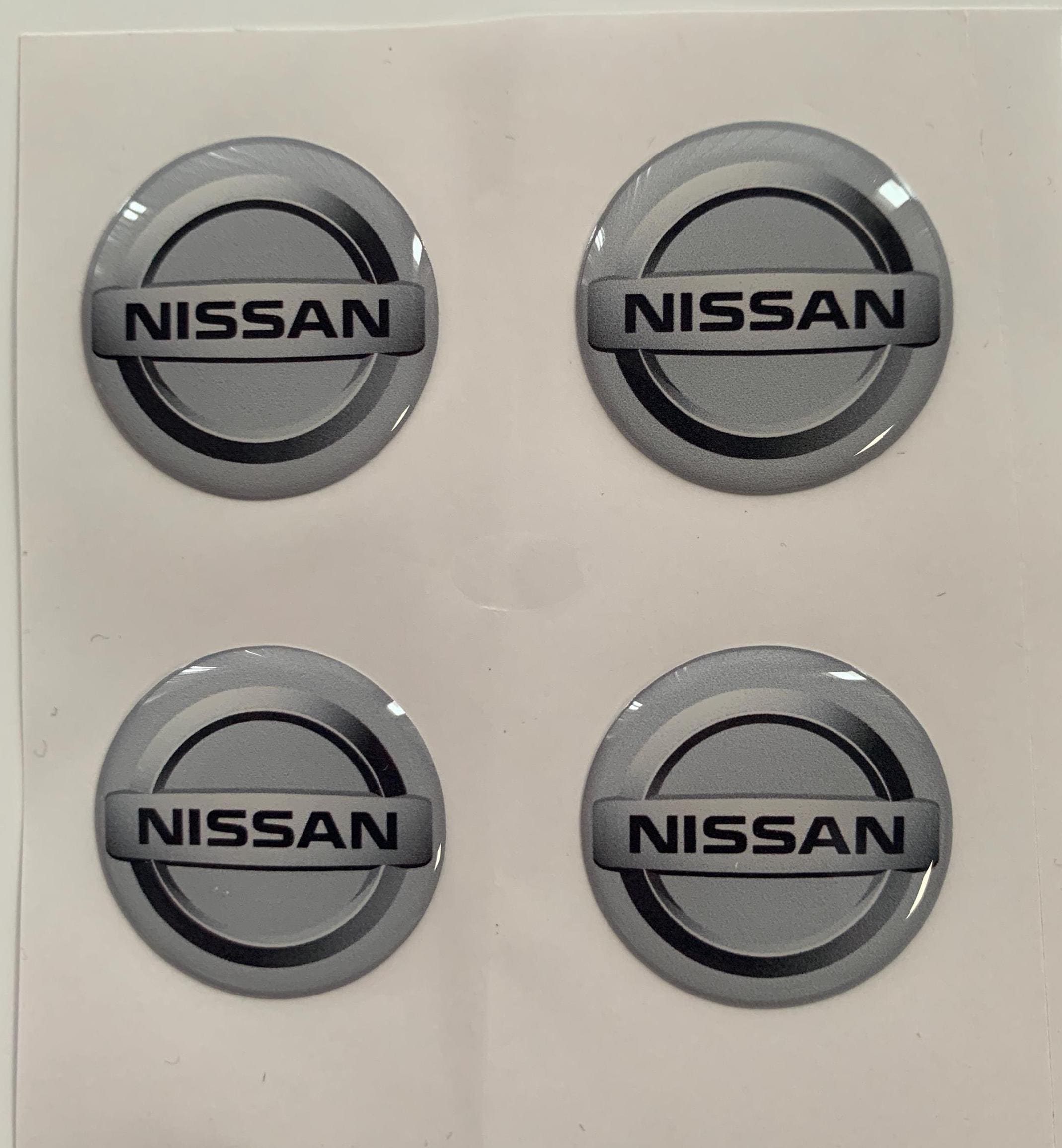 Excellent Quality / Set X 4 Self Adhesive Silicone Stickers Logo Nissan ...