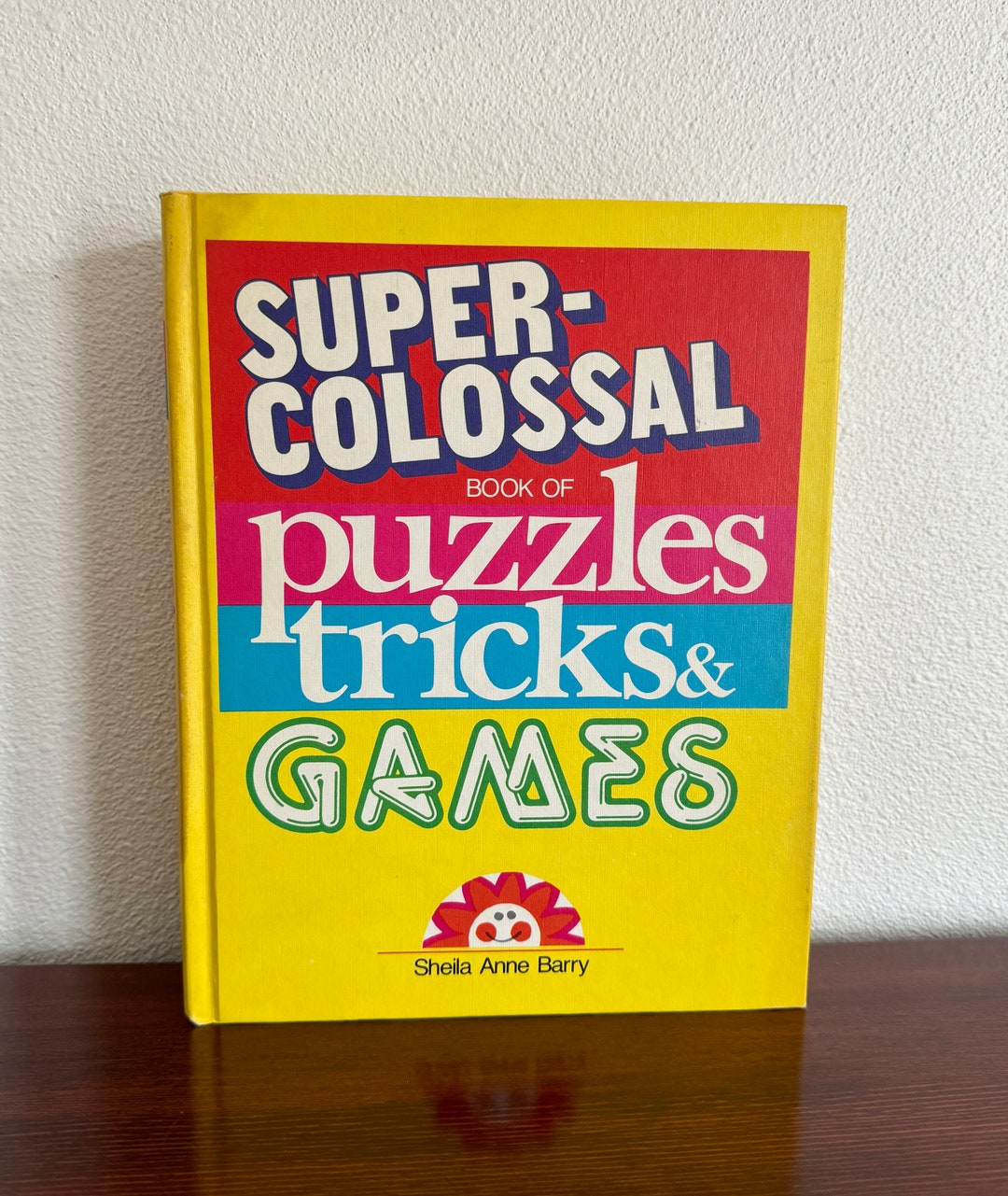 Super-colossal Book of Puzzles Tricks & Games by Sheila Anne Barry ...