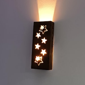 Rustic Wood Wall Lamp Featuring Glowing Star Cutouts, Cozy Lighting for ...