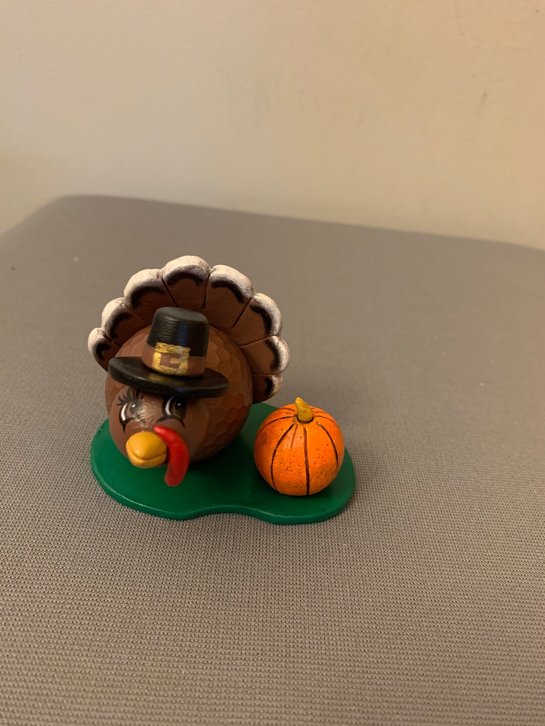 Turkey Made With a Recycled Golf Ball With a Pilgrim Hat and Pumpkin ...