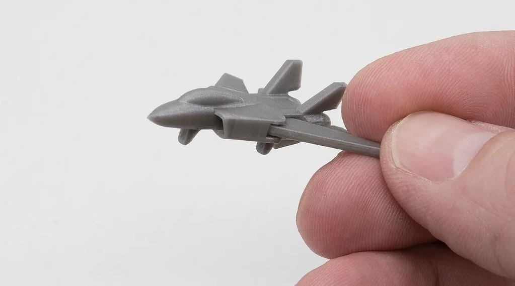 3D Printed Jet Fighter Toy - Articulated Mini Jet in Egg Shell Case ...