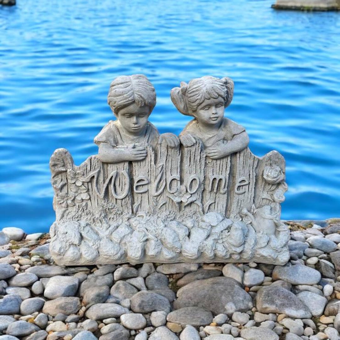Welcome Sign on Picket Fence Statue, Stone Boy With Girl Figure, Two ...