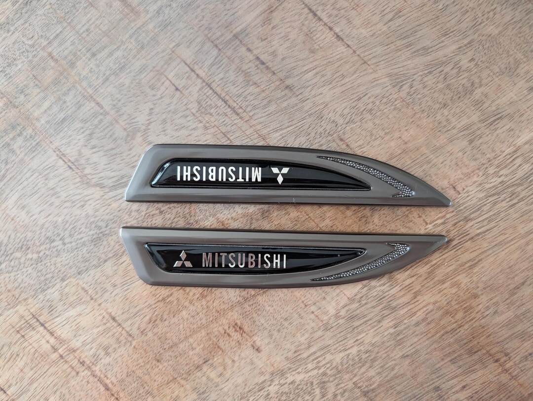 2 Mitsubishi Aluminum Emblems - Dark Grey Finish for Fenders and Sides ...