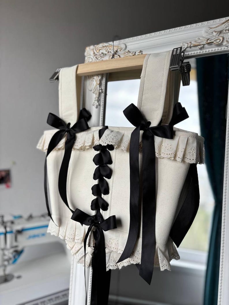 Vintage-inspired Corset With Delicate Lace Trim and Elegant Black Bows ...