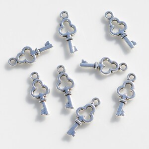 BULK 50 Tiny Key Silver Tone Charms SC5639 - Etsy