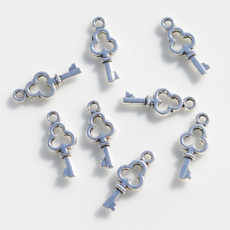 1 Tiny Key Silver Tone Charm SC5639 | Etsy