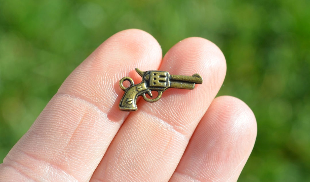 BULK 50 Hand Gun Bronze Tone Charms BC2500 - Etsy