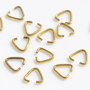 50 Gold Tone 9 Mm Triangle Jump Ring Pinch Bail F123 - Etsy