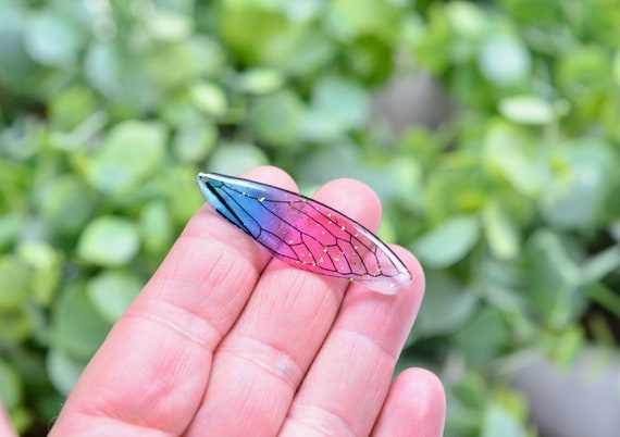 Butterfly wing charm store