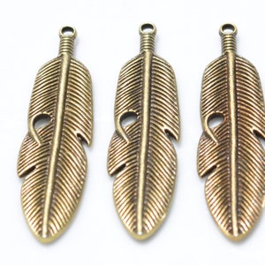 1 Large Feather Bronze Tone Charm BC3165 - Etsy