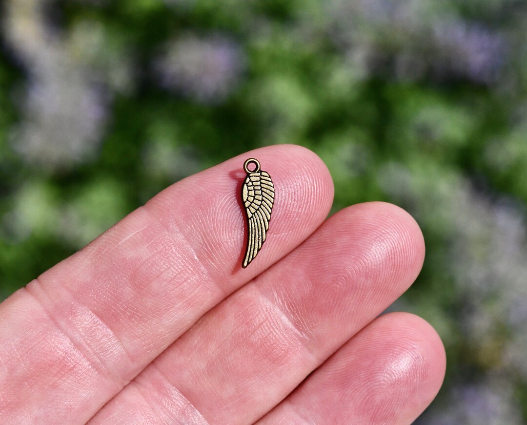 15 Tiny Wing Bronze Tone Charms BC3110 - Etsy