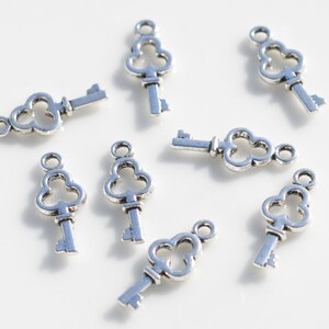 BULK 50 Tiny Key Silver Tone Charms SC5639 - Etsy