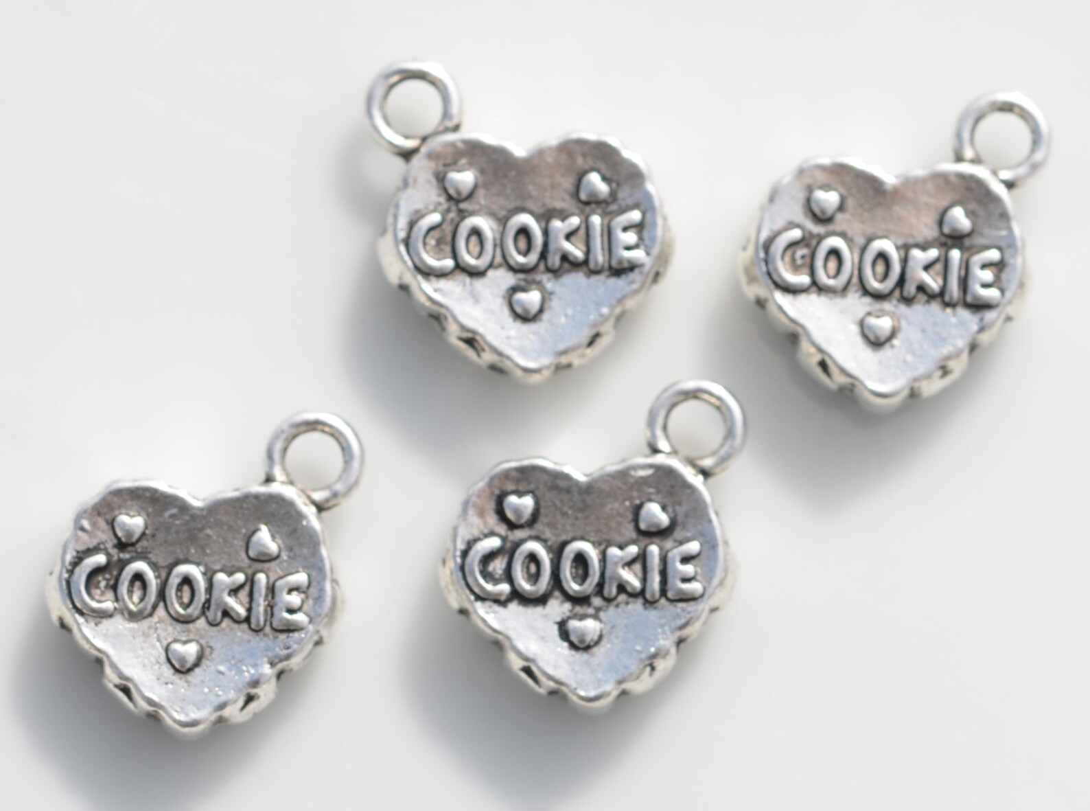 BULK 50 Silver Heart Shaped Cookie Charms SC2455 - Etsy