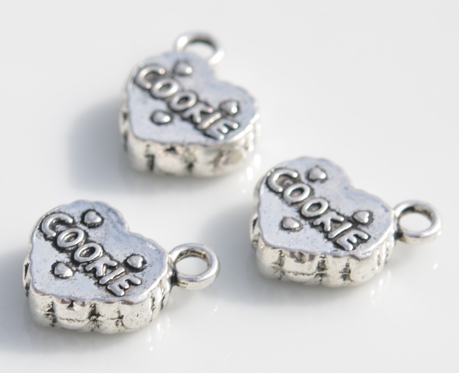 BULK 50 Silver Heart Shaped Cookie Charms SC2455 - Etsy