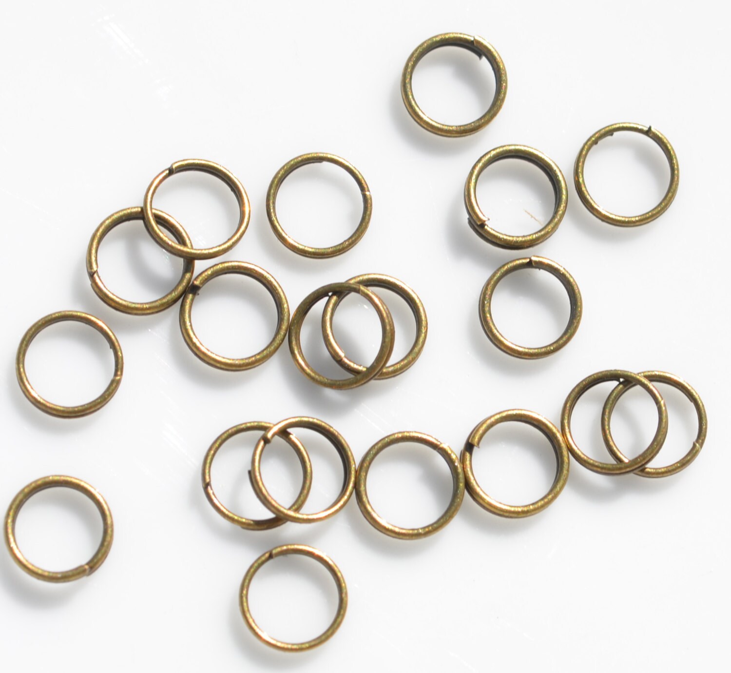 100 Bronze Tone 7mm Split Jump Rings F112 - Etsy