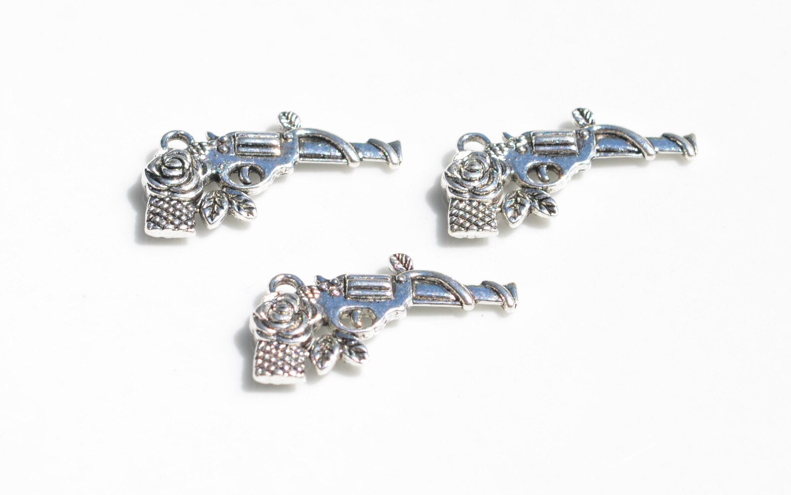 BULK 20 Flower Hand Gun Silver Tone Charms SC2042 - Etsy