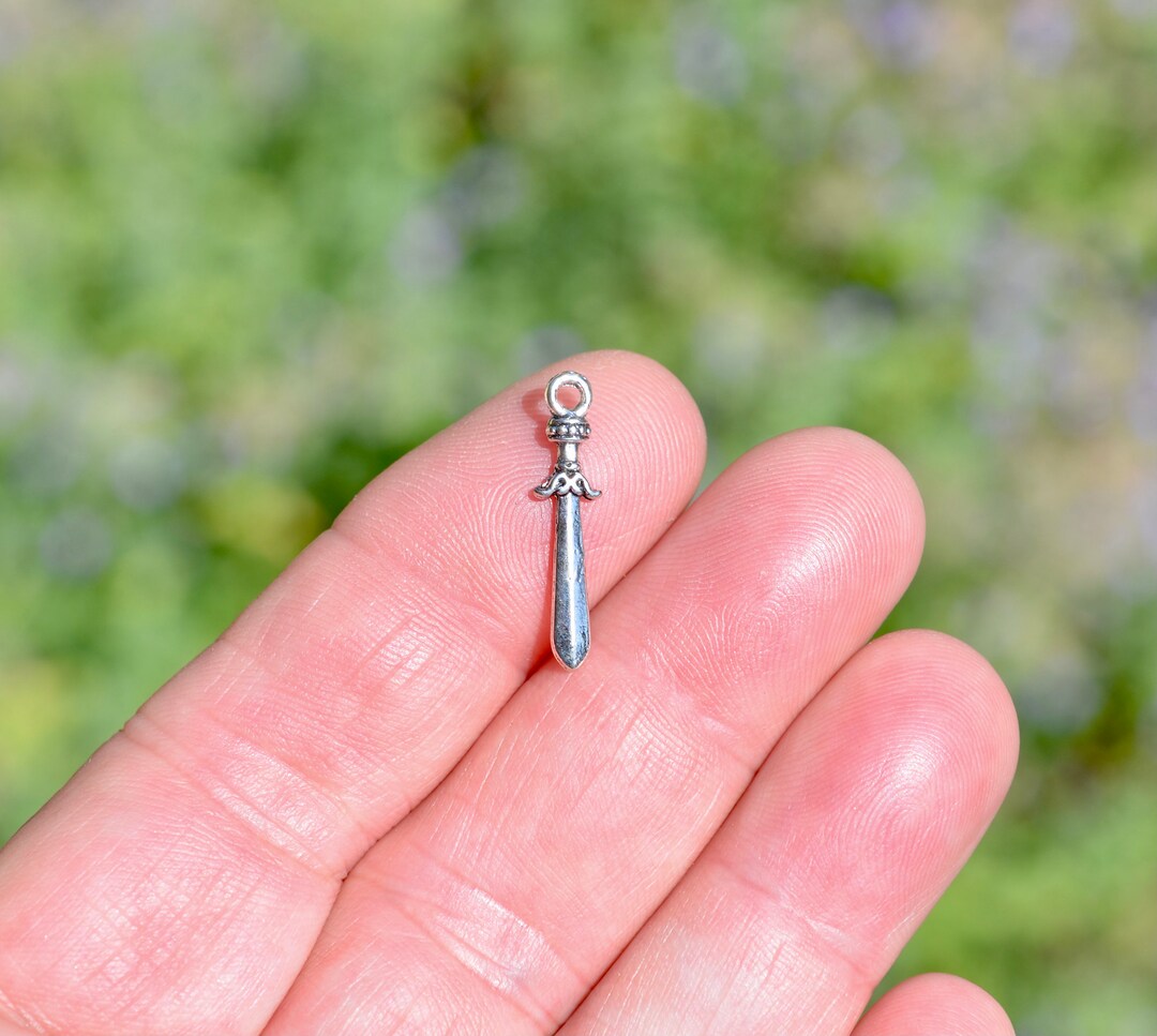10 Sword Silver Tone Charms SC3953 - Etsy