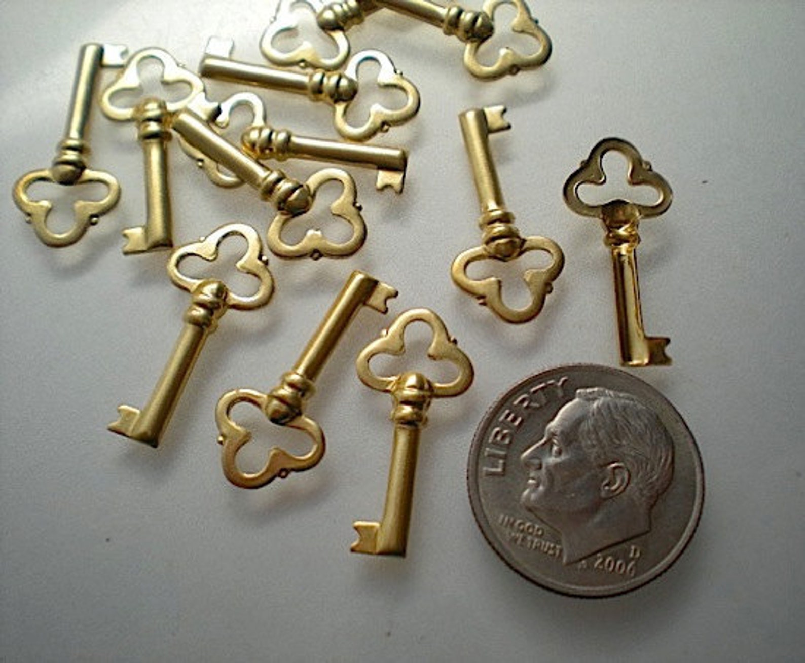 12 Small Brass Key Charms 1 | Etsy