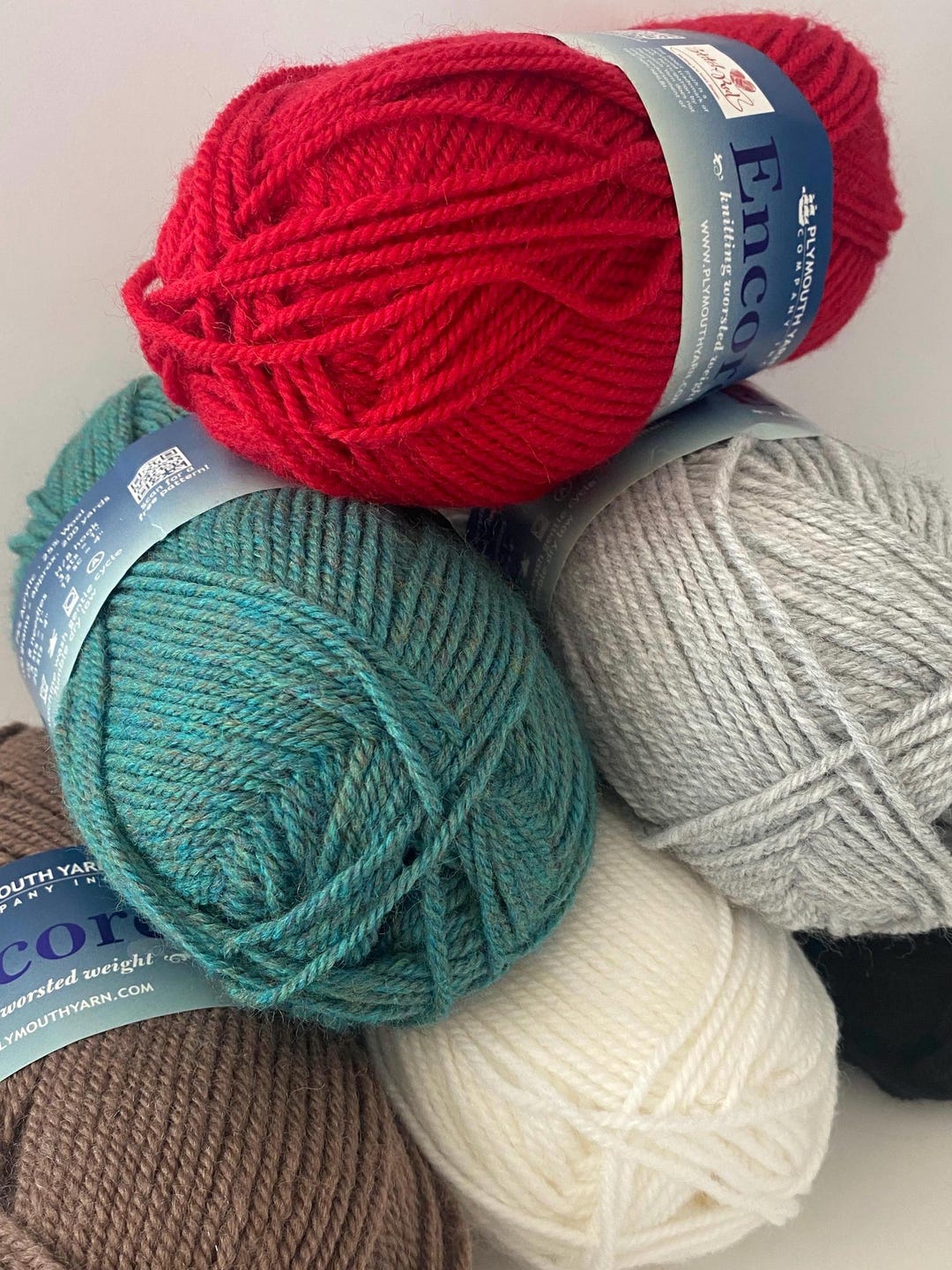 Plymouth Encore Worsted Weight Yarn | 217-black, 475-stitch Red, 687-emerald Heather, 6007-light ...