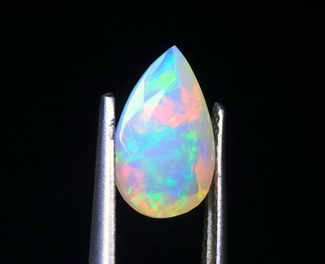AAA+ Genuine Ethiopian Opal Faceted Cut Gemstone: 1.50 CT Pear Natural ...