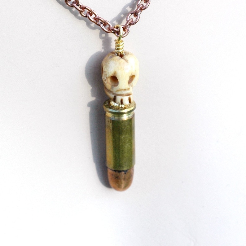 Bone and Bullet --- Hand Carved Bone Skull and Antiqued 25 Caliber ...