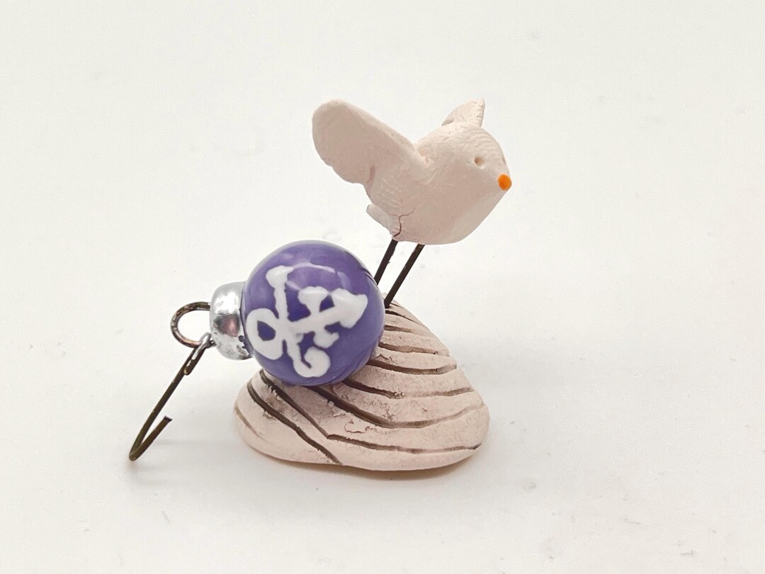 Miniature Handmade Dove Flying off Shell With Purple Prince Symbol ...