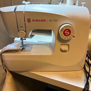 Singer Sewing Machine M1150- With Accessories! Free Arm, 45 Stitch ...