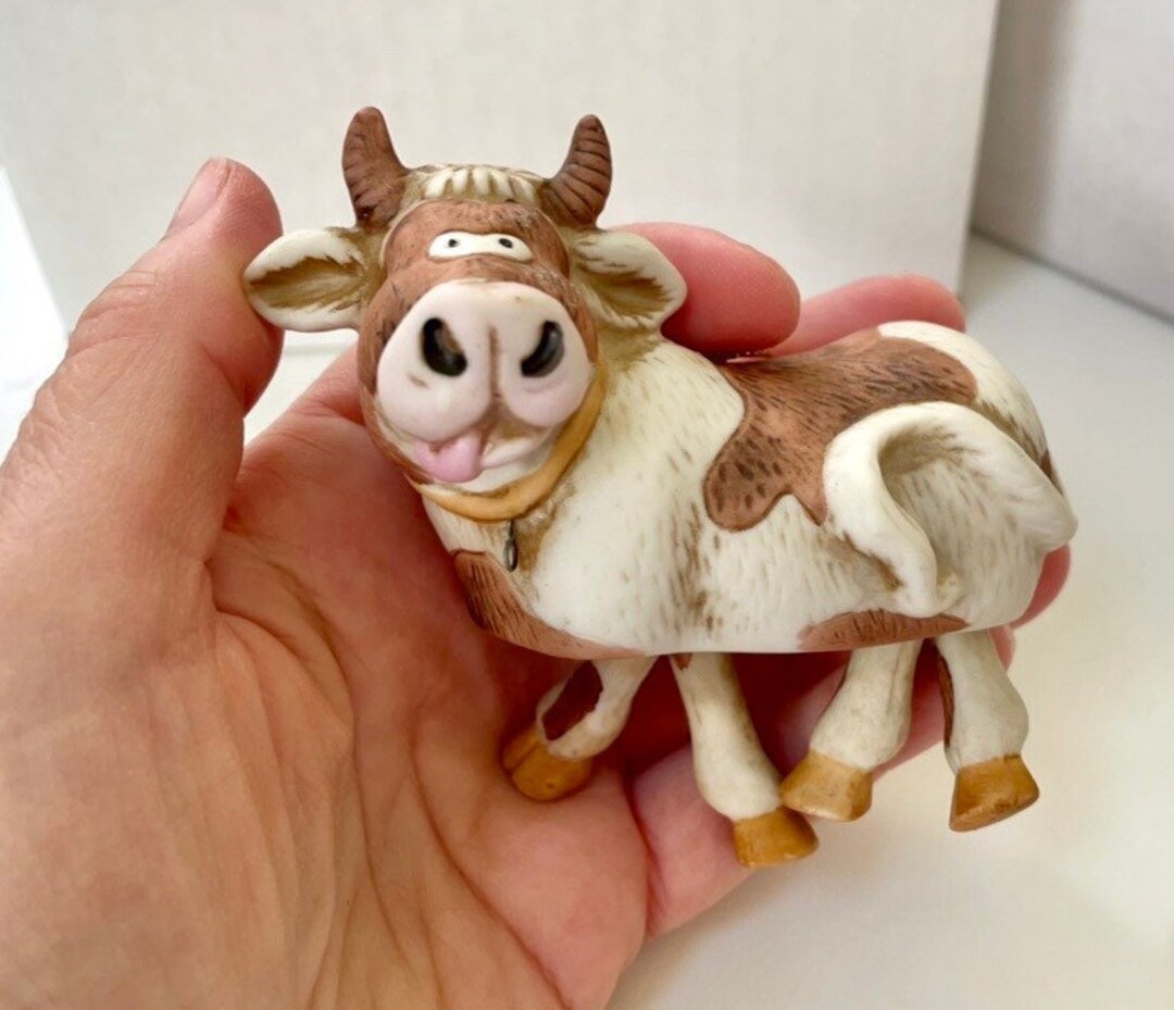 Signed Roman - Vintage Porcelain Cow Ornament With Hinged Legs That ...